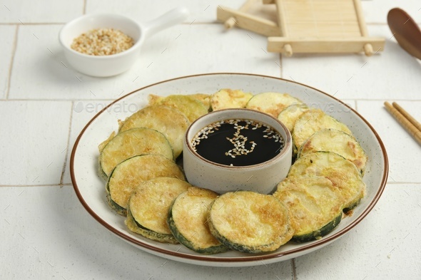 Hobak Jeon, pan fried zucchini with dipping sauce Stock Photo by edgunn36