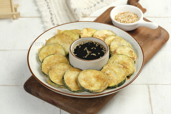 Hobak Jeon, pan fried zucchini with dipping sauce Stock Photo by edgunn36