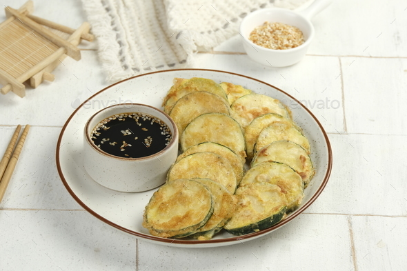 Hobak Jeon, pan fried zucchini with dipping sauce Stock Photo by edgunn36