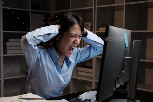 Stressful young Asian business woman having a mental breakdown after ...