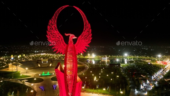 Huma bird monument in the New Uzbekistan park in Tashkent city at night ...