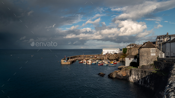 Coverack harbour landscape with rainbow and stormy skies Stock Photo by ...