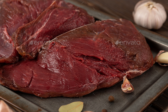 Fresh, raw wild boar meat Stock Photo by natalya_ugr | PhotoDune