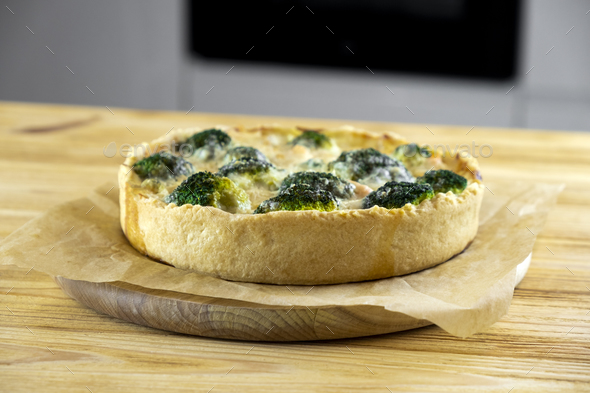 Classic Quiche with salmon, spinach and broccoli. Fish tart. Stock ...