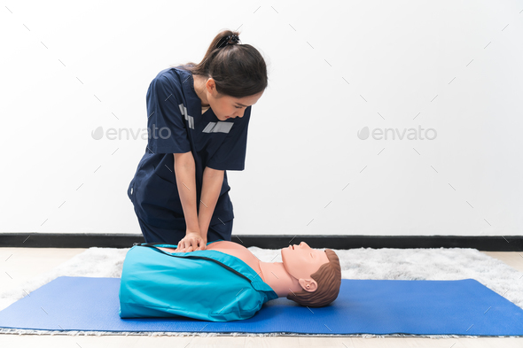 CPR Training ,Emergency and first aid class on cpr doll ...