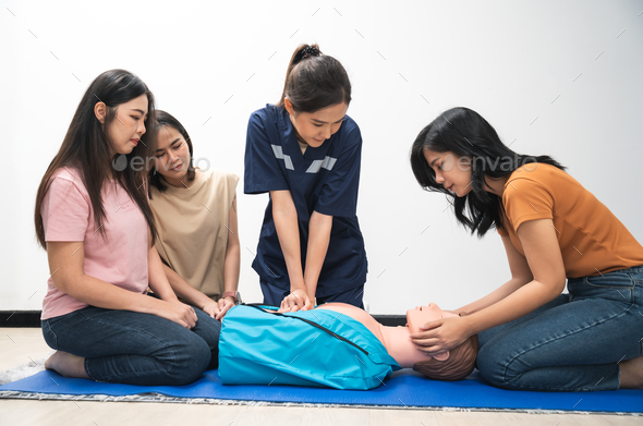CPR Training ,Emergency and first aid class on cpr doll ...