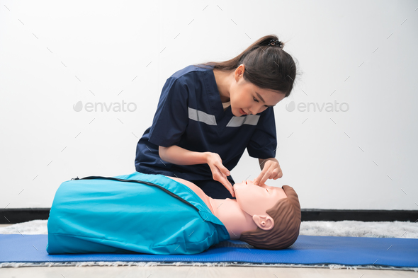 CPR Training ,Emergency and first aid class on cpr doll ...