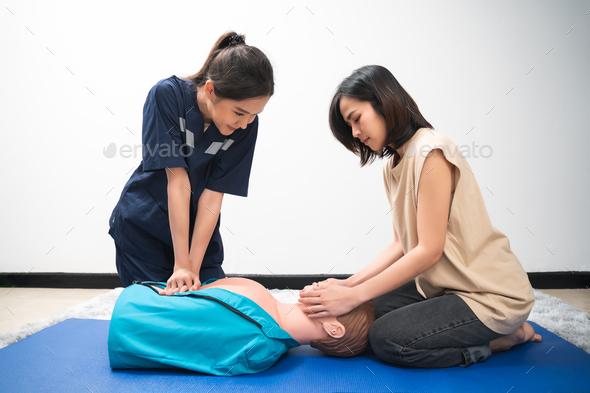 CPR Training ,Emergency and first aid class on cpr doll ...