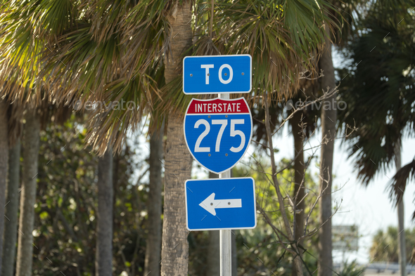 Blue direstional road sign indicating direction to I-275 freeway ...