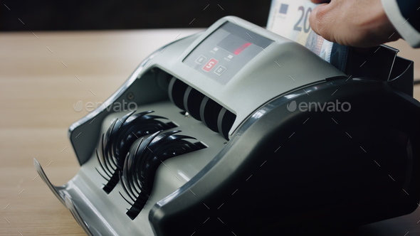 Money cash counting electronic calculation machine close up. Automatic ...