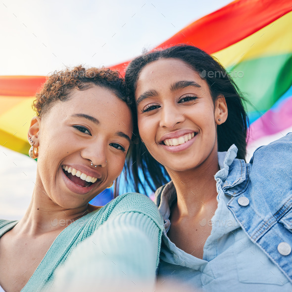 Portrait, couple and lesbian with women in selfie, pride flag and lgbt ...