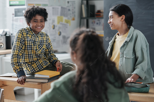 School children talking after lesson Stock Photo by Media_photos ...