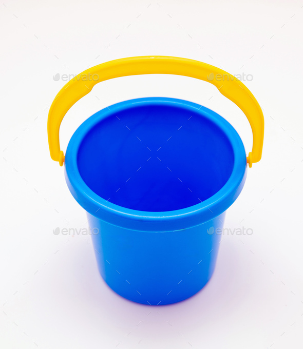 Blue bucket toy with yellow handle isolated on white. Baby and kid ...