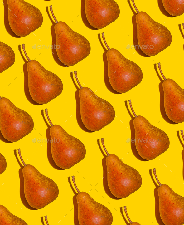 Pear pattern. Yellow and orange Bera pears on yellow background. Ripe ...