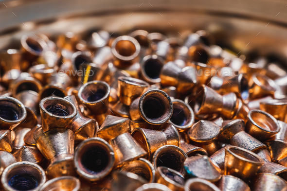 Heap of copper air-gun-pellets; ammunition from an airgun Stock Photo ...