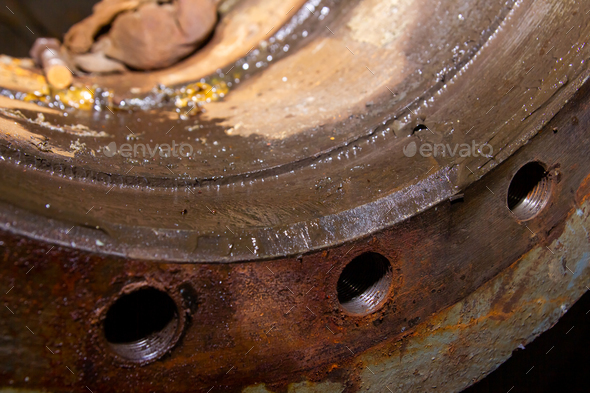 Closeup of a rustic metal flange corrosion Stock Photo by wirestock