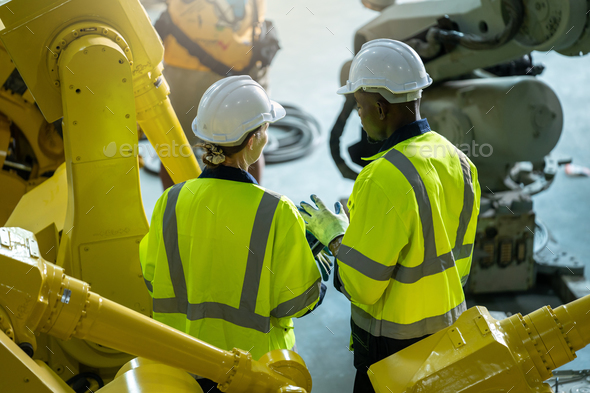 Engineer check and control welding robotics automatic arms machine at ...