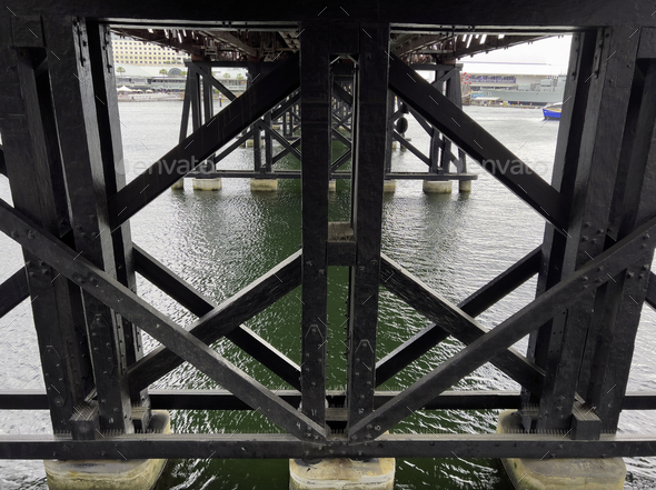 Underneath metal structure of Pyrmont Bridge, Sydney, New South Wales ...