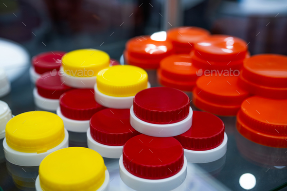 Plastic screw caps. Caps packaging concept. Bottle caps and closures ...