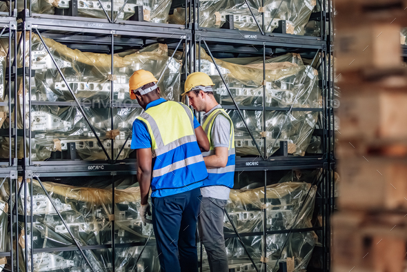 Warehouse staff scan, tag, verify automotive items using handheld ...