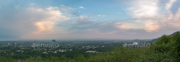 Panoramic aerial view of cloudy sky and Islamabad cityscape from Daman ...