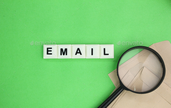 magnifying glass and envelope with the word email alphabet. Stock Photo ...