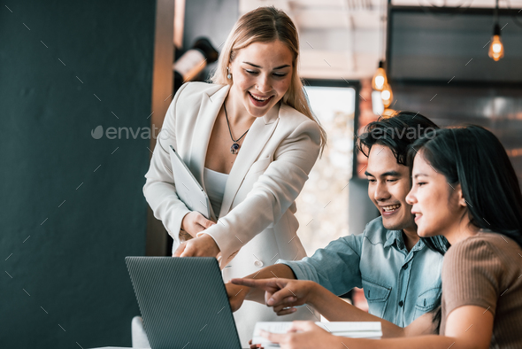 Post-class, college students collaborate, and exchange ideas in tech ...