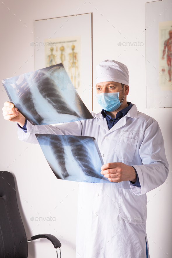 Doctor man with X-ray of lungs, fluorography, roentgen isolated on ...