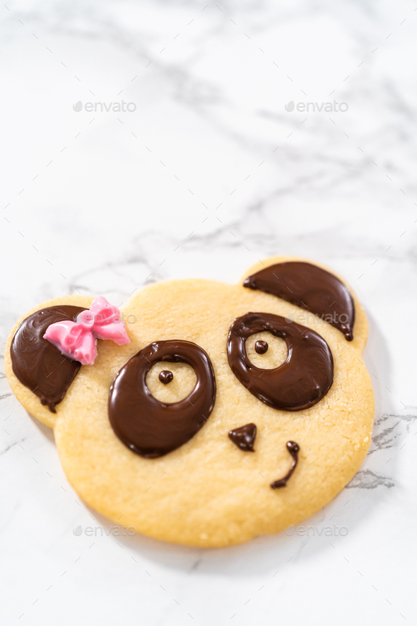 Panda shaped shortbread cookies with chocolate icing Stock Photo by ...