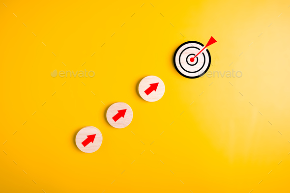 Target and arrow up icons for business objective target goal concept ...