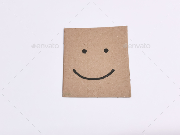 Hand drawn happy face on brown paper. Positive attitude concept. Stock ...