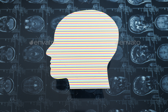 Images of MRI or magnetic resonance imaging with a paper human head ...