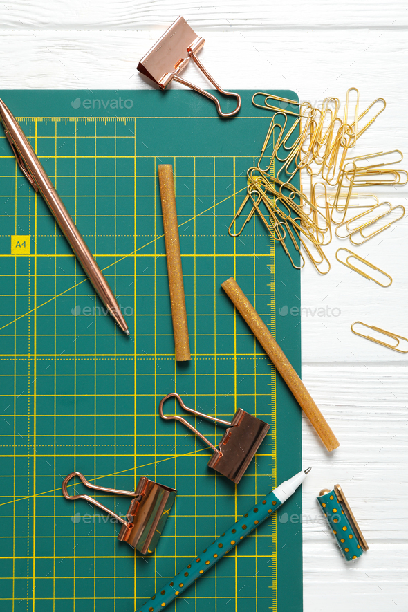 Patchwork accessories concept on white background, cutting mat Stock ...