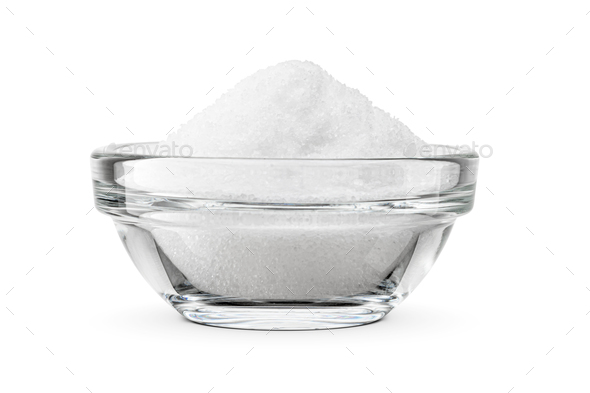 Fine ground salt in glass transparent bowl isolated on white background ...