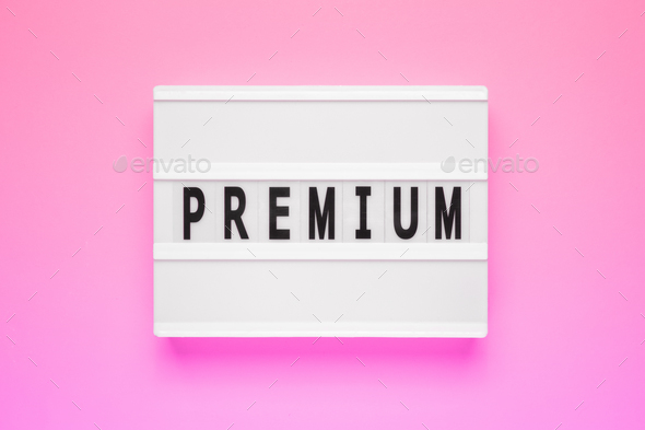 The word premium on lightbox isolated pink background. Premium ...
