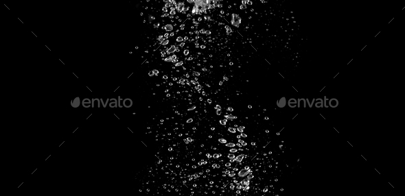 Blurry images of soda bubbles splashing in black background Stock Photo by gnepphoto