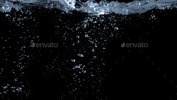 Blurry images of soda bubbles splashing in black background Stock Photo by gnepphoto