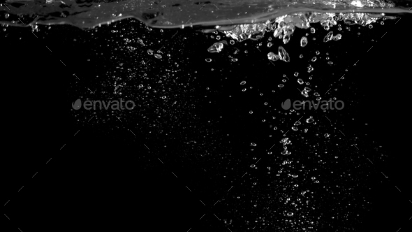 Blurry images of soda bubbles splashing in black background Stock Photo by gnepphoto