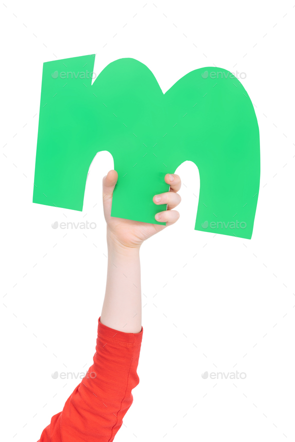 Kid holding colorful alphabet letter M in hand isolated, alphabet ...