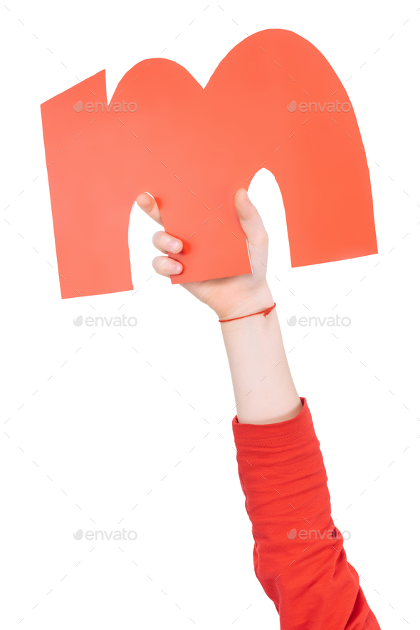 Kid holding colorful alphabet letter M in hand isolated, alphabet ...