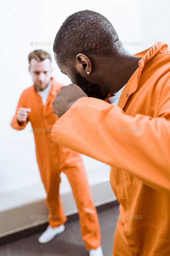 multiethnic prisoners fighting in prison cell Stock Photo by ...