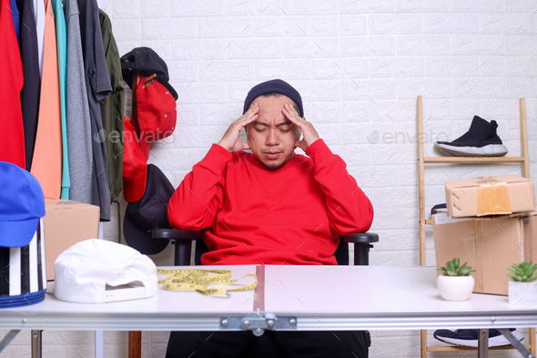 Sad Asian business owner feel headache, worried and depressed Stock ...