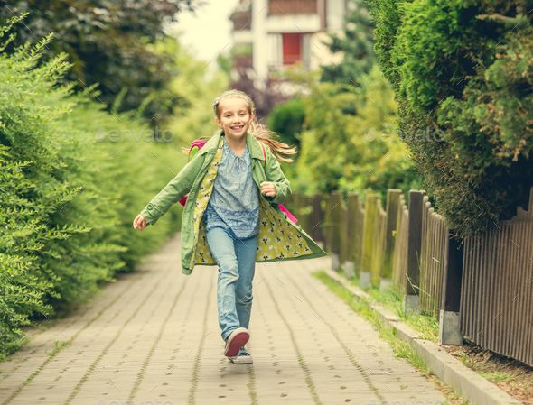 little girl go home from school Stock Photo by tan4ikk | PhotoDune