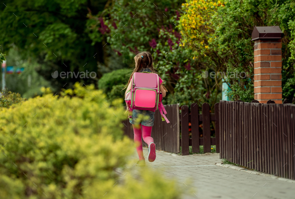 little girl run to school Stock Photo by tan4ikk | PhotoDune