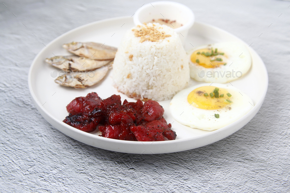 Freshly cooked Filipino food called Tocilog Stock Photo by junpinzon