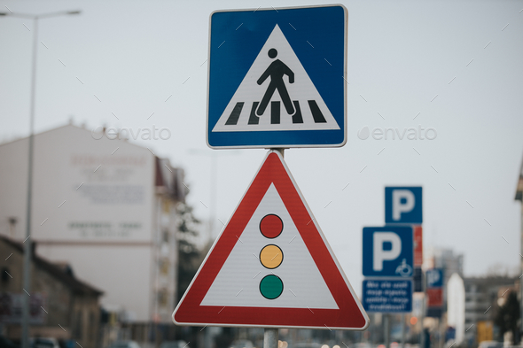 Closeup shot of traffic signs on the street Stock Photo by wirestock
