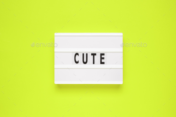 The word cute on lightbox isolated green background. Positive Words ...