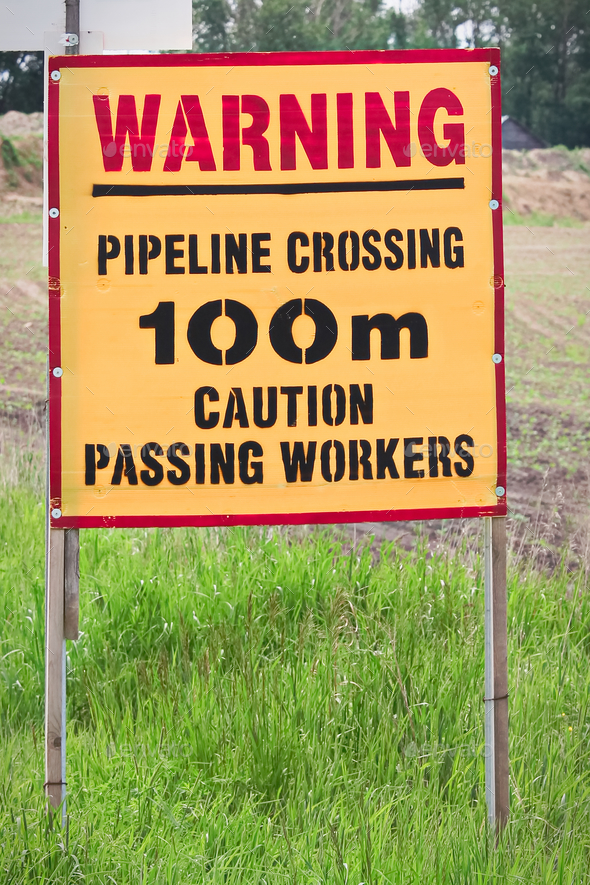 Warning Pipeline Crossing Caution sign Stock Photo by wirestock | PhotoDune