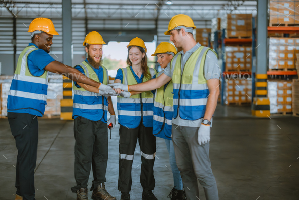 Diverse warehouse team create empowerment, confidence. Collaboration ...