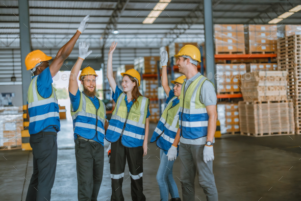 Diverse warehouse team create empowerment, confidence. Collaboration ...
